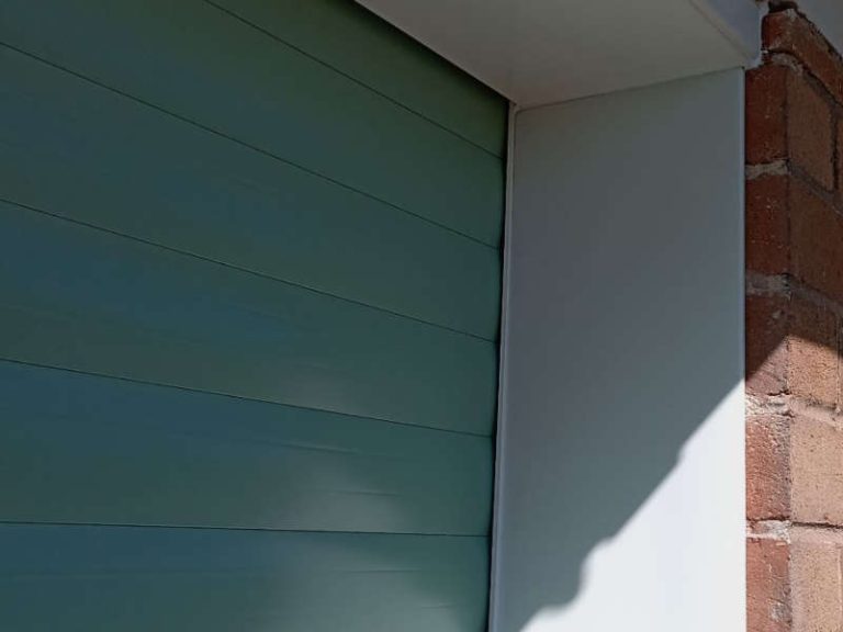 Green Insulated Roller Garage Door Leeds - Blueberry Automation